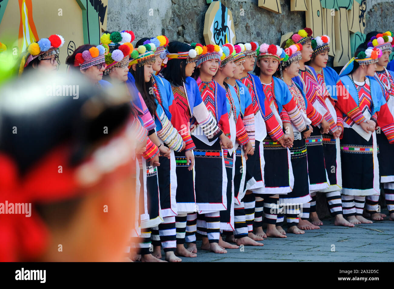 Song and dance celebration of the red and blue-robed Tsou tribe at the ...