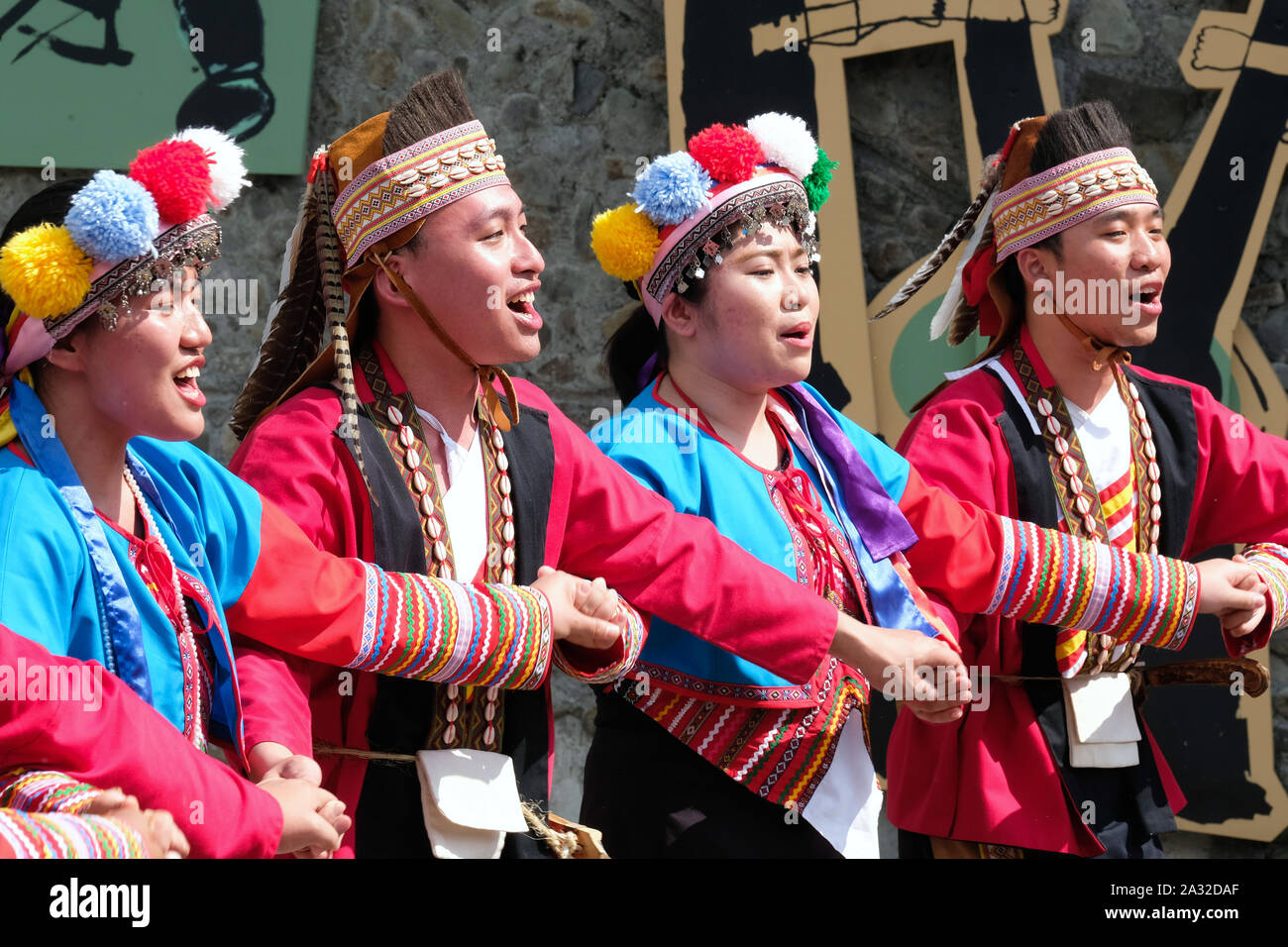 Song and dance celebration of the red and blue-robed Tsou tribe at the ...