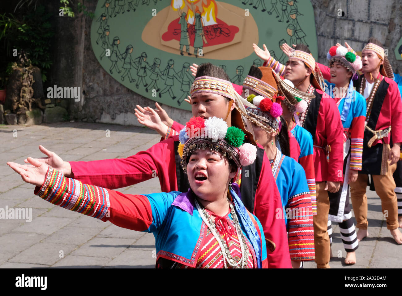 Song and dance celebration of the red and blue-robed Tsou tribe at the ...