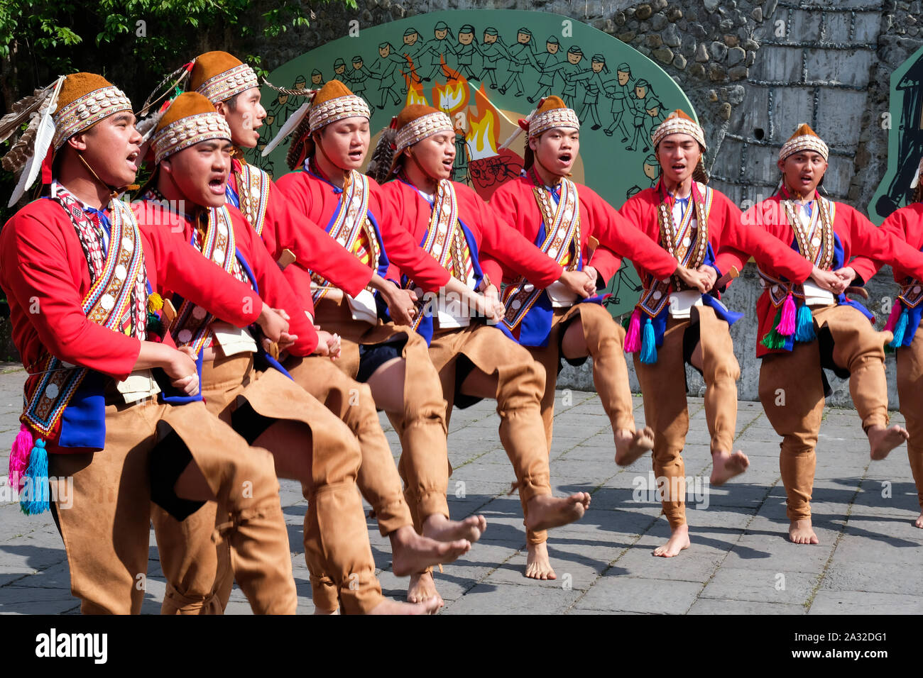 Song and dance celebration of the red and blue-robed Tsou tribe at the ...