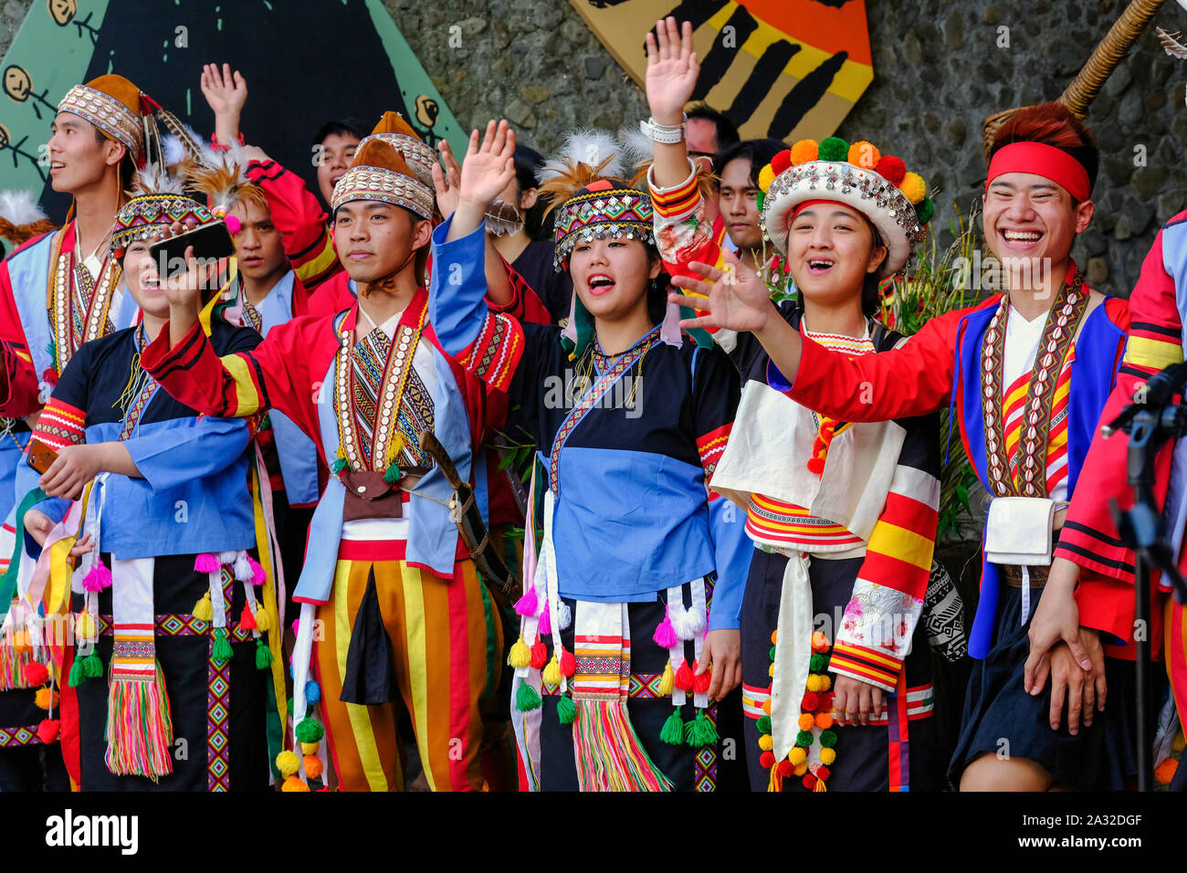 Song and dance celebration of the red and blue-robed Tsou tribe at the ...