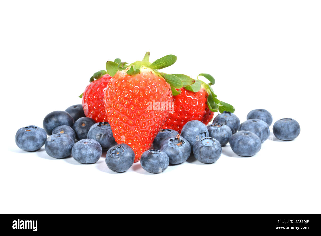 Strawberries and blueberries isolated over white. Berry mix Stock Photo ...