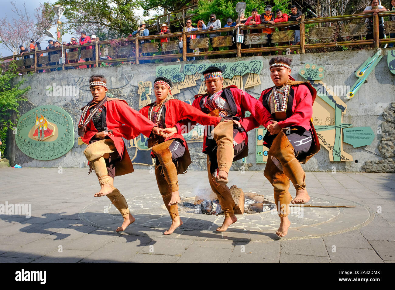 Song and dance celebration of the red and blue-robed Tsou tribe at the ...