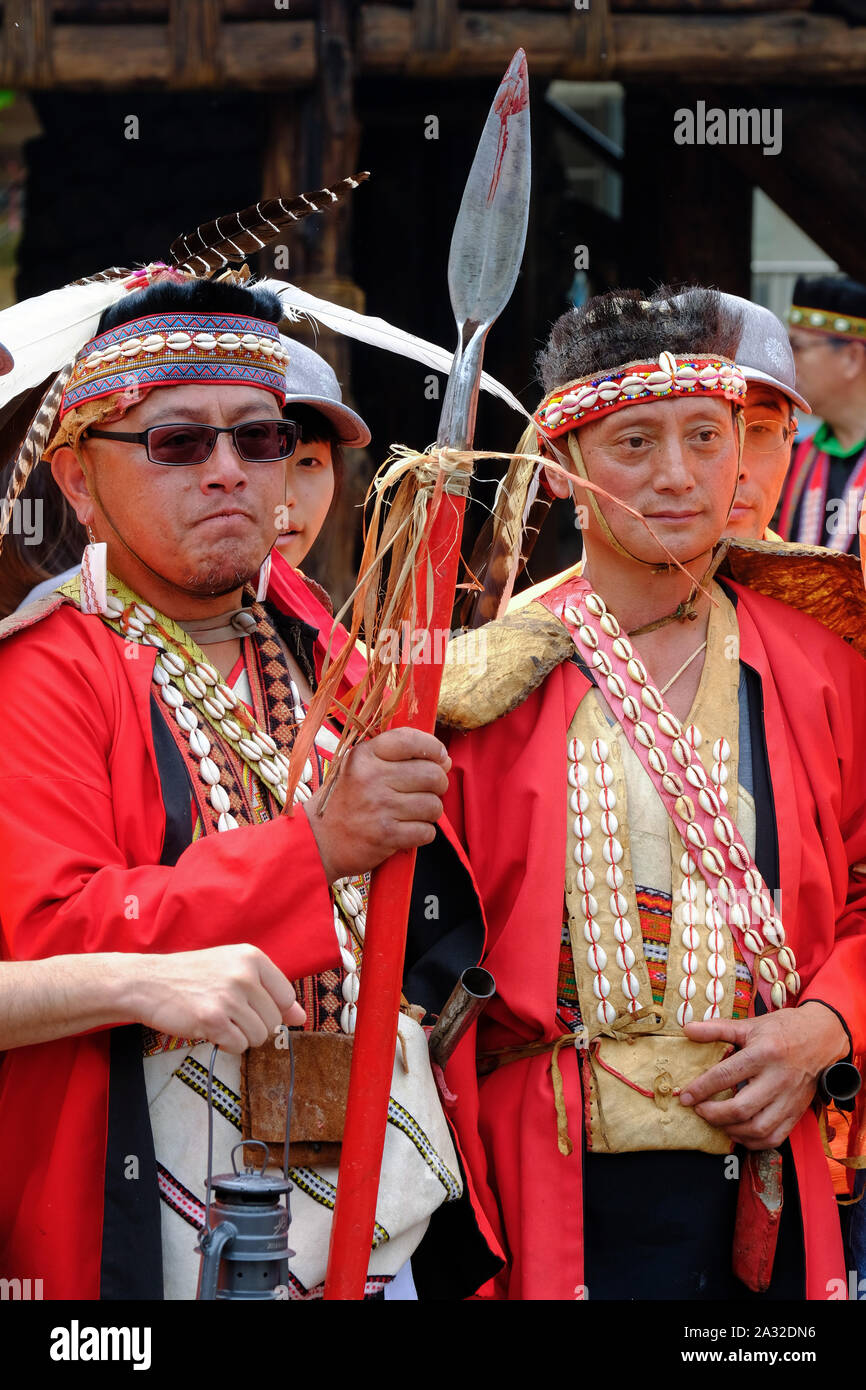 Red-robed Tsou men parade at the Tsou Mayasvi festival in the village ...