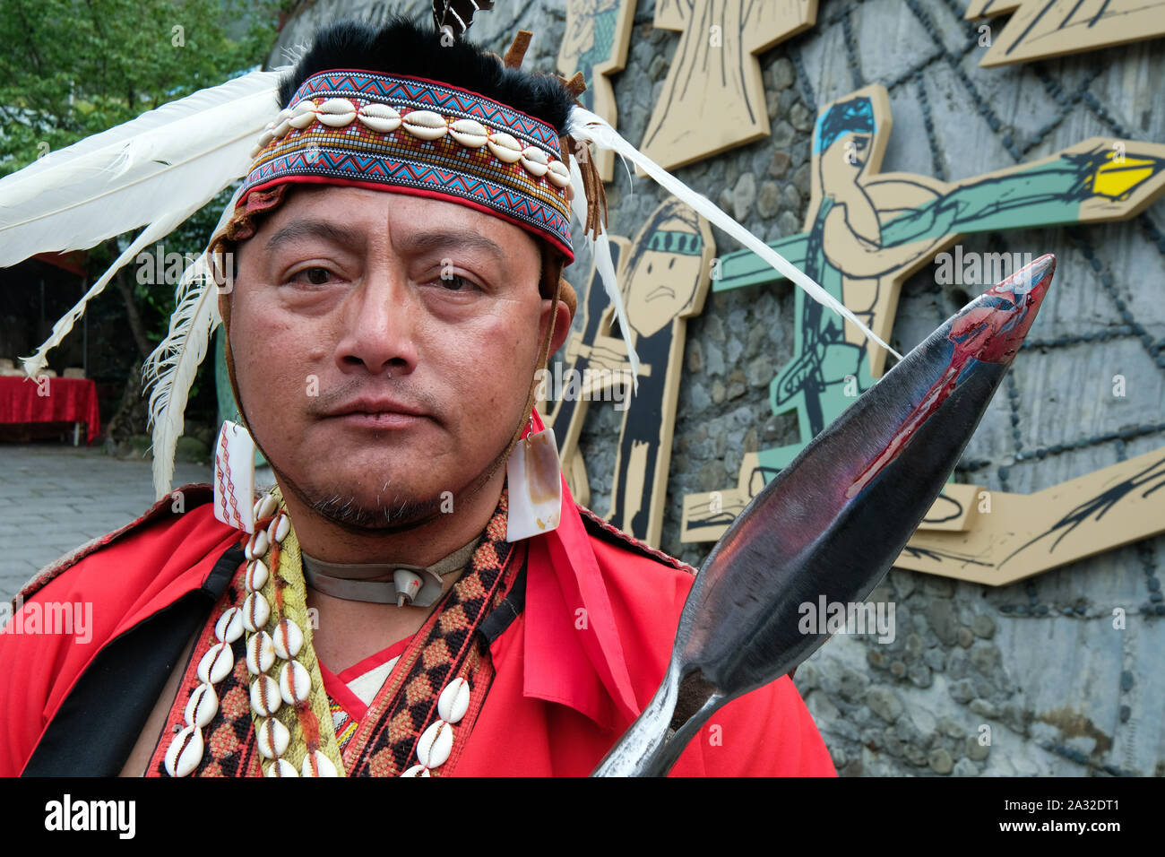 Red-robed Tsou men parade at the Tsou Mayasvi festival in the village ...