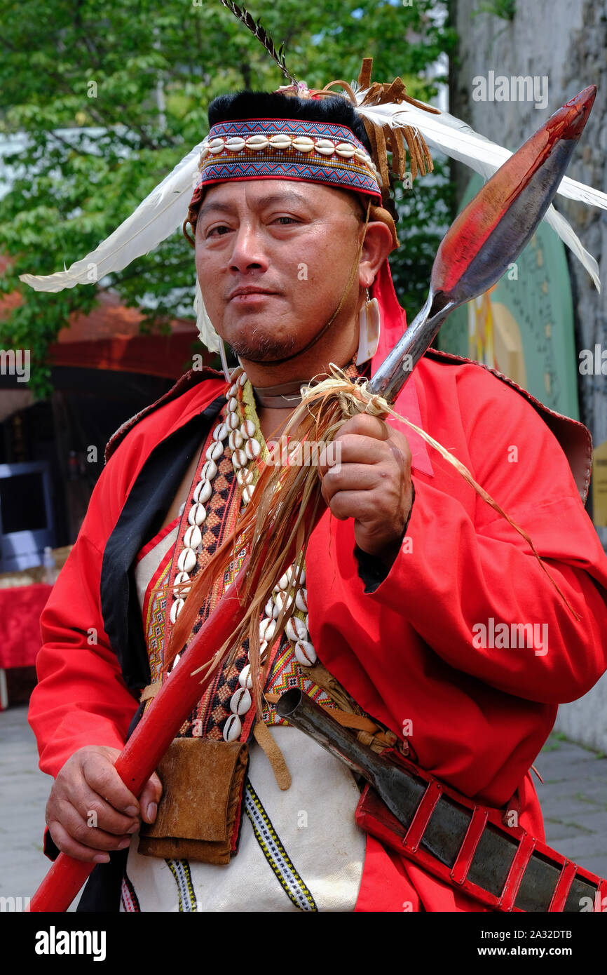 Red-robed Tsou men parade at the Tsou Mayasvi festival in the village ...