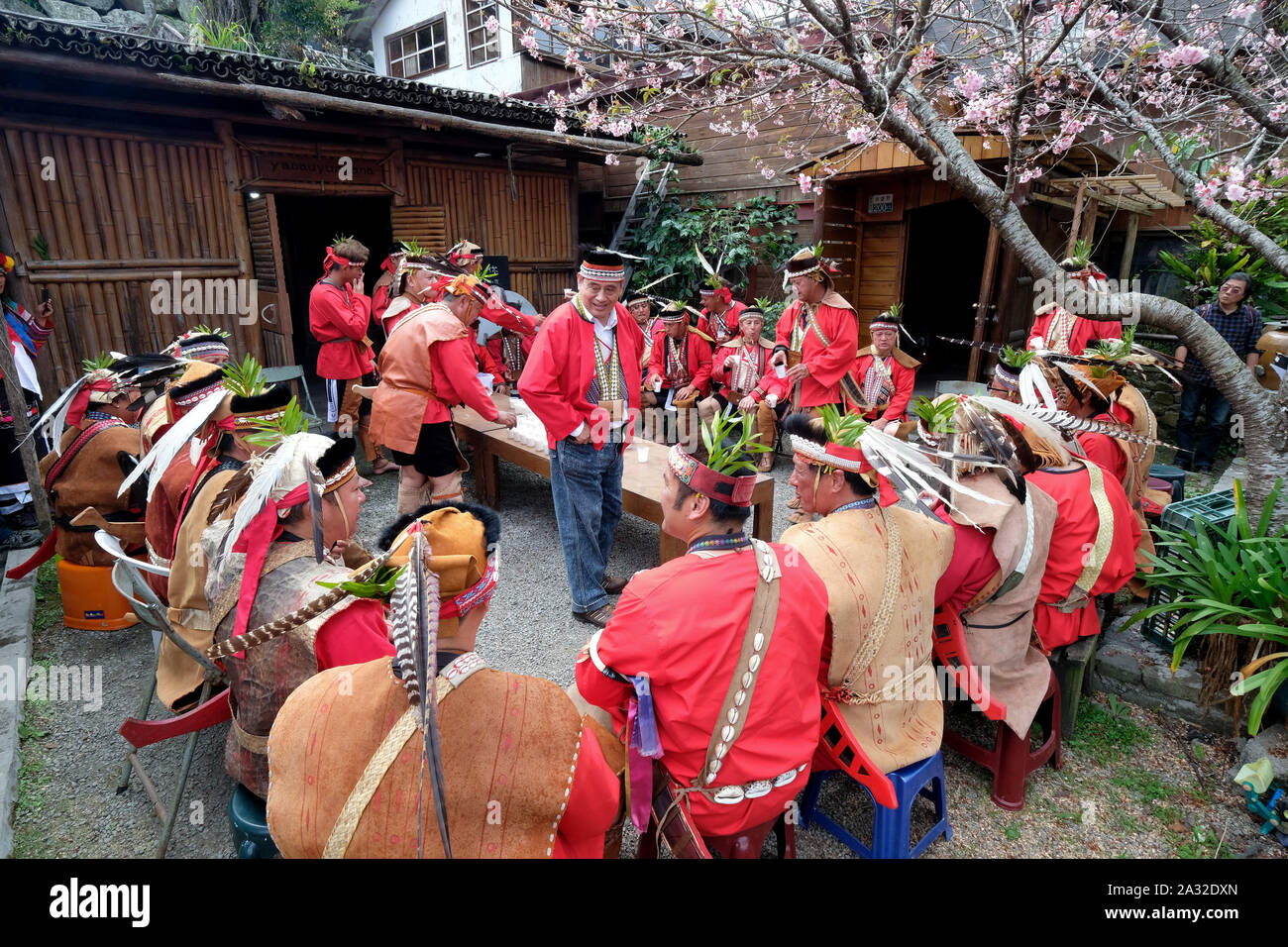 Red-robed Tsou men parade at the Tsou Mayasvi festival in the village ...