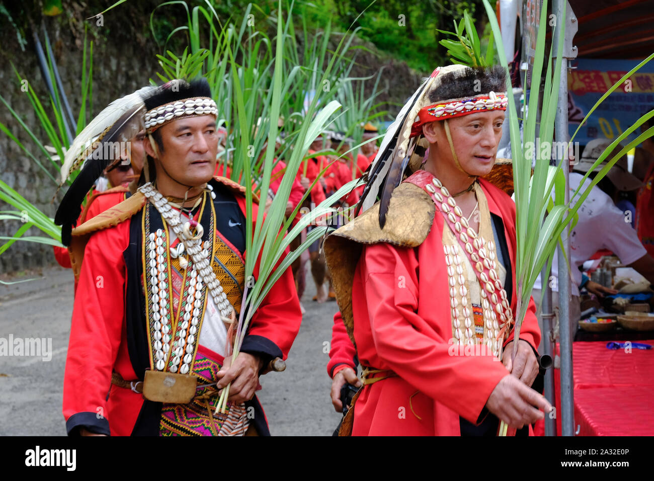 Red-robed Tsou men parade at the Tsou Mayasvi festival in the village ...