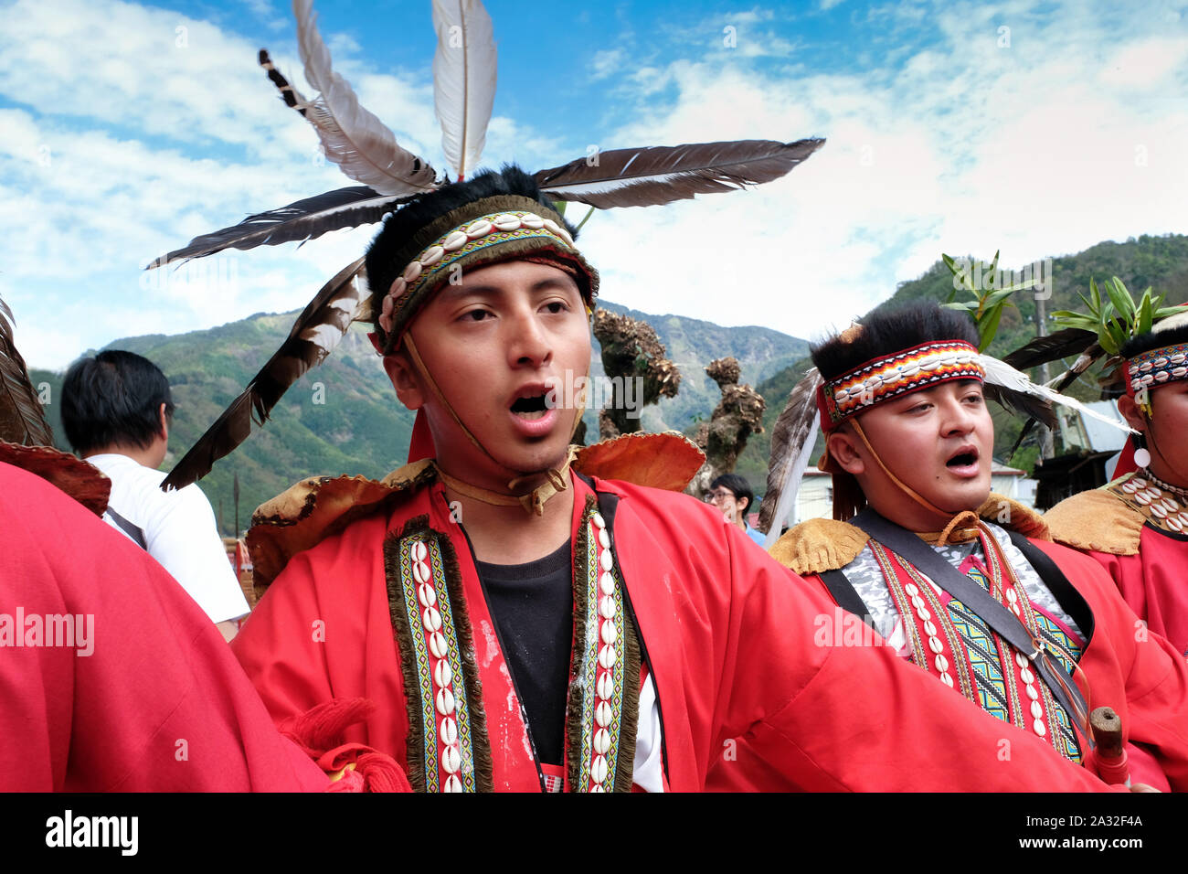 Song and dance celebration of the red and blue-robed Tsou tribe at the ...