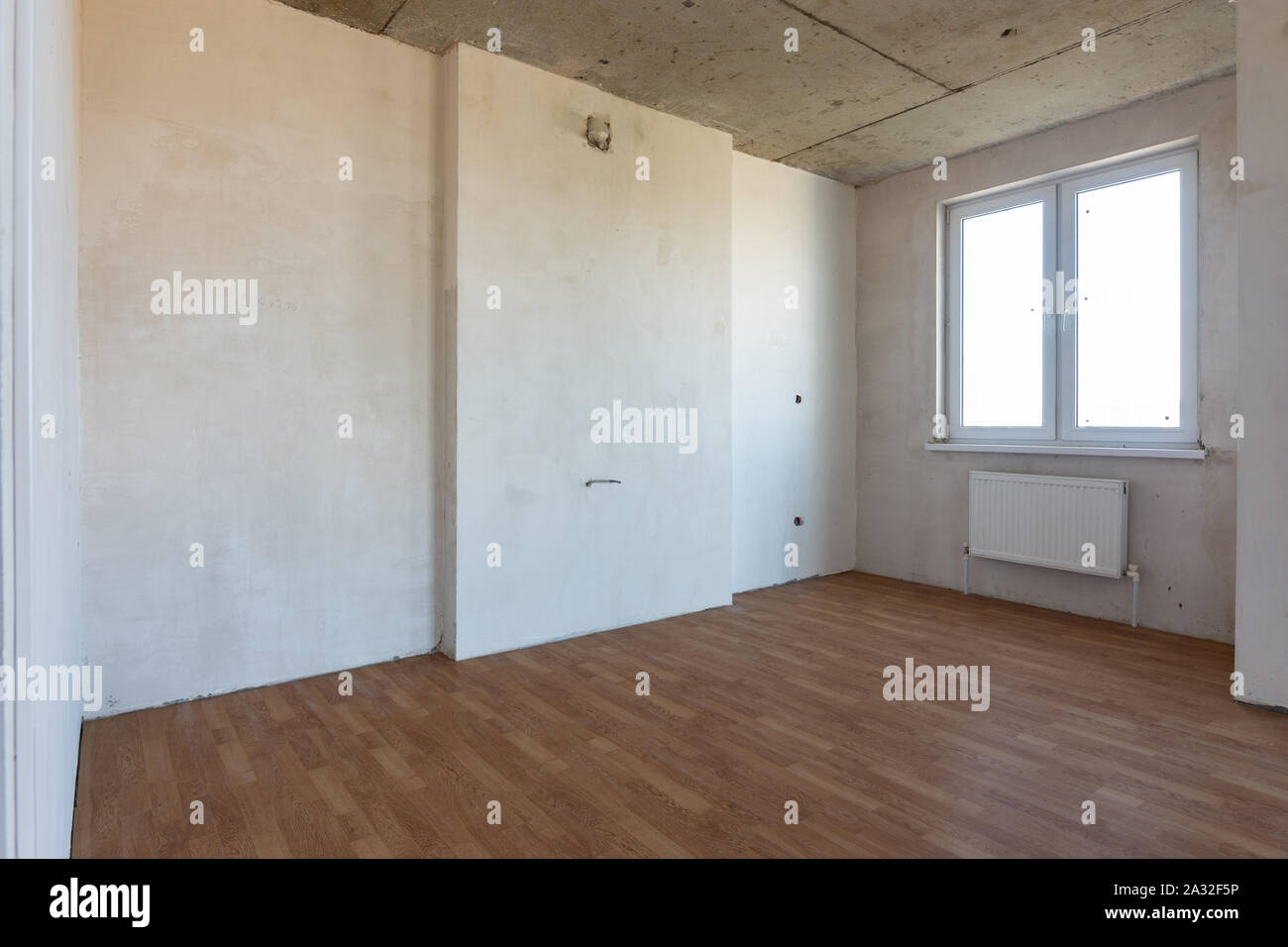 Fragment of an interior in a new building, a room with a fine finish ...