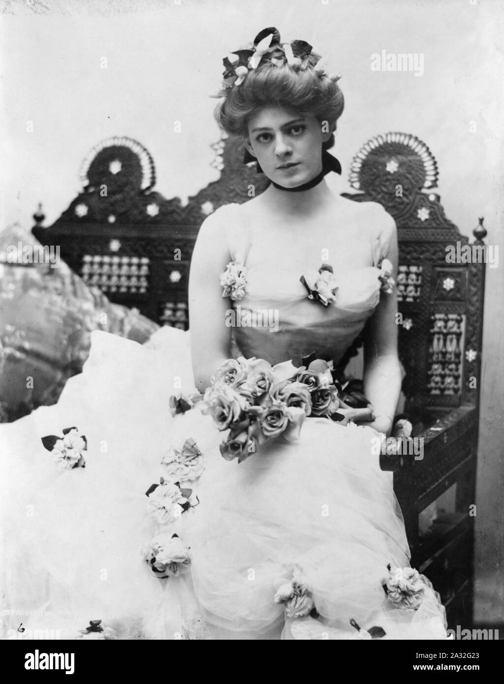 Ethel Barrymore, three-quarter length portrait, seated, facing front ...