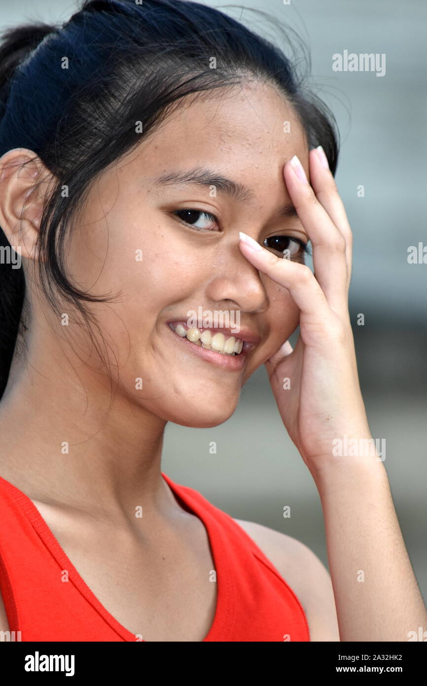 An Asian Girl And Shyness Stock Photo - Alamy