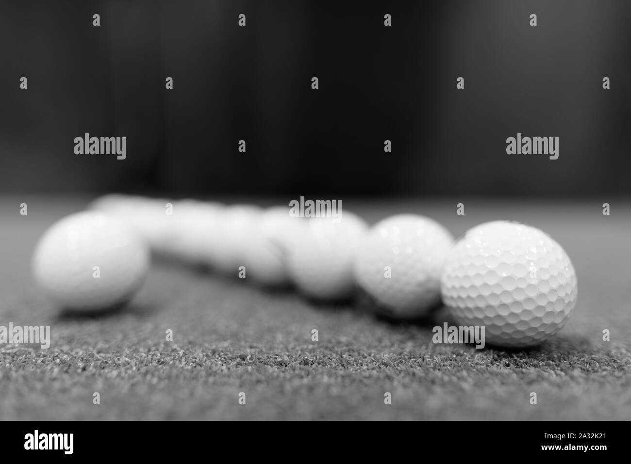 Golf Balls On Ground Shot in Black And White Stock Photo - Alamy