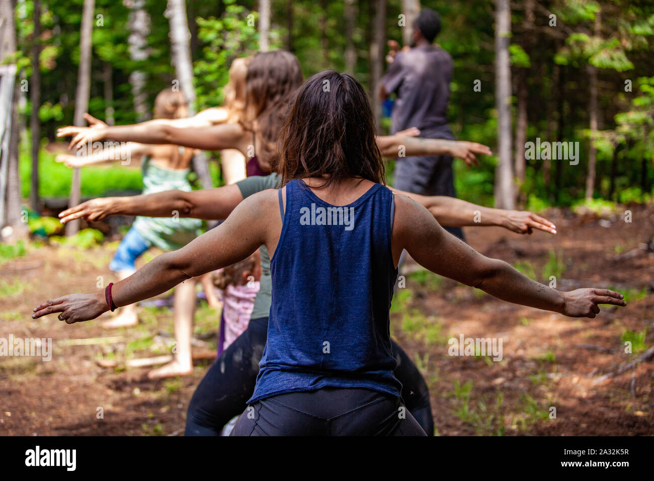 People seeking mindfulness and enlightenment are seen from behind as ...