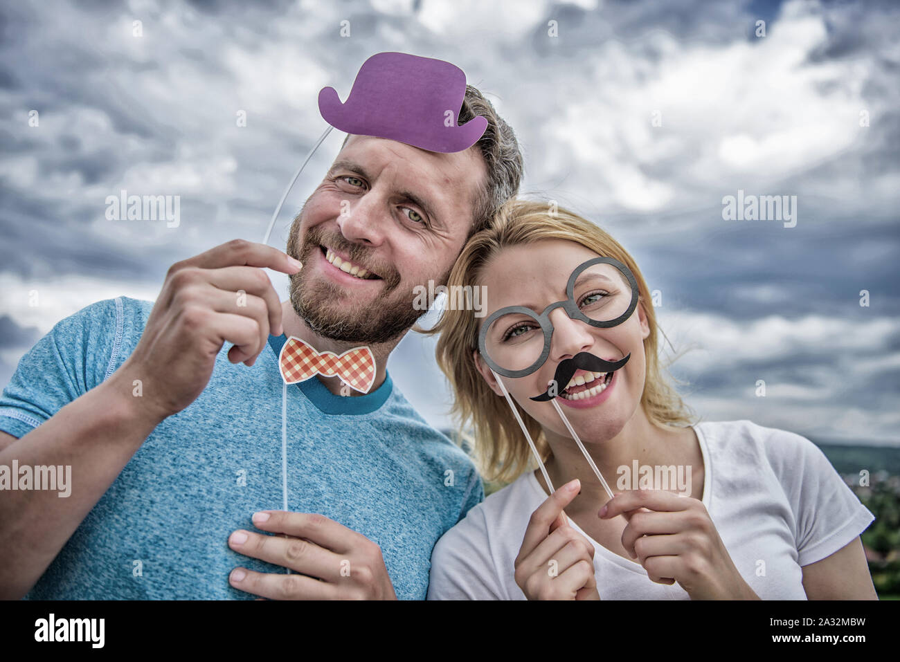 Group of friends enjoying party and fooling around between themselves ...