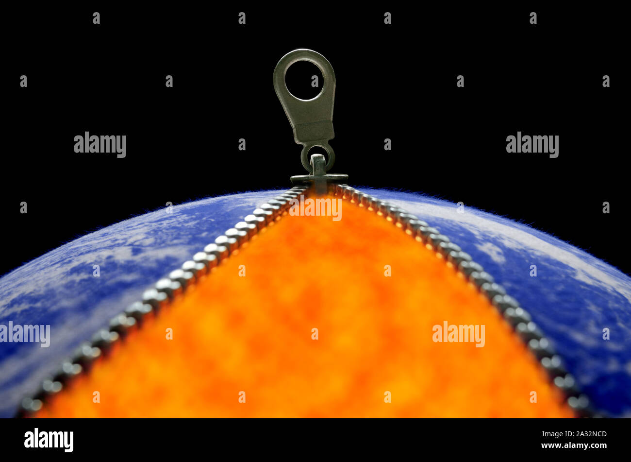 Climate change, illustrated by Earth-like fabric ball with opened ...