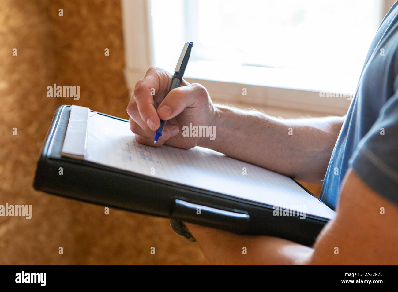 Person and notes on wall and room hi-res stock photography and images ...