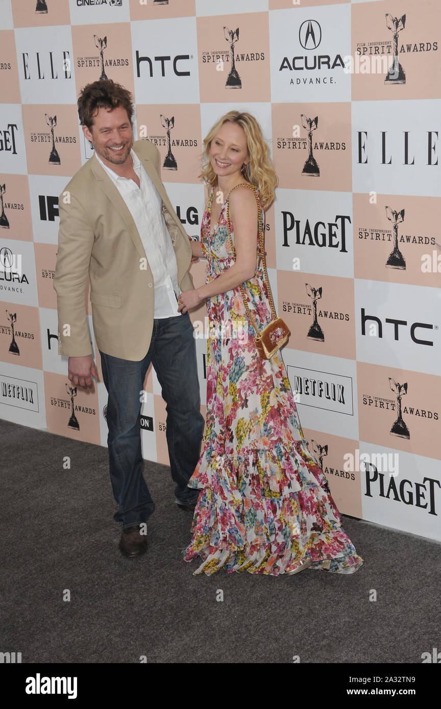 LOS ANGELES, CA. February 26, 2011: James Tupper & Anne Heche at the ...