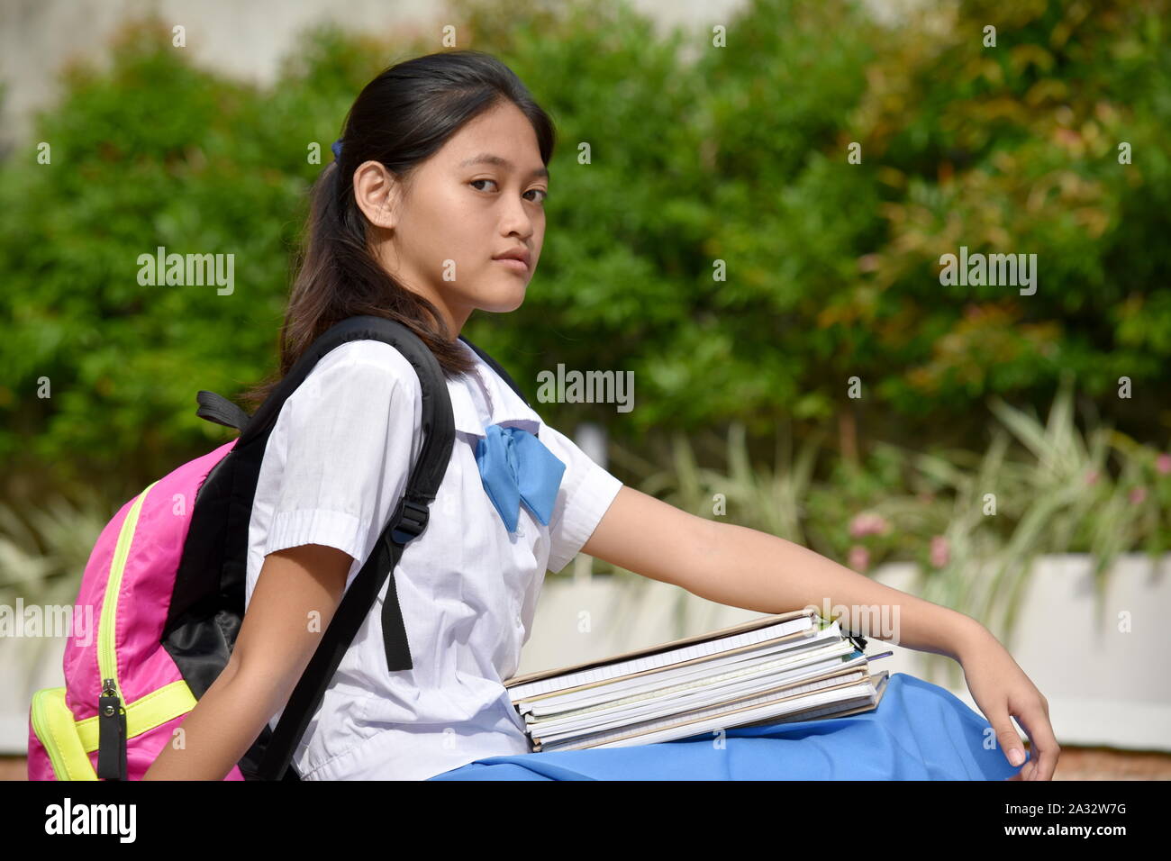 A Young Minority Student Teenager Sitting Stock Photo - Alamy