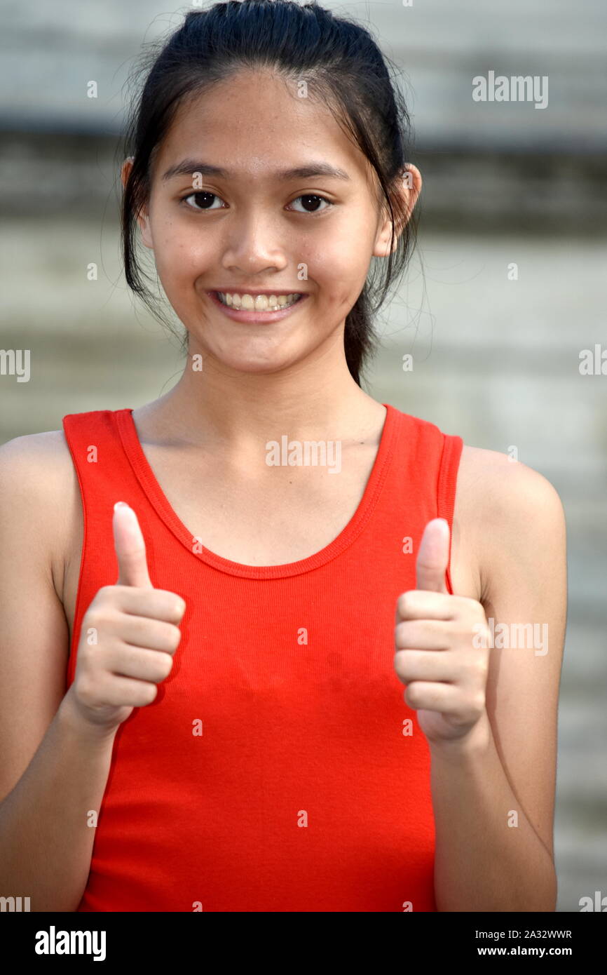 A Female With Thumbs Up Stock Photo - Alamy