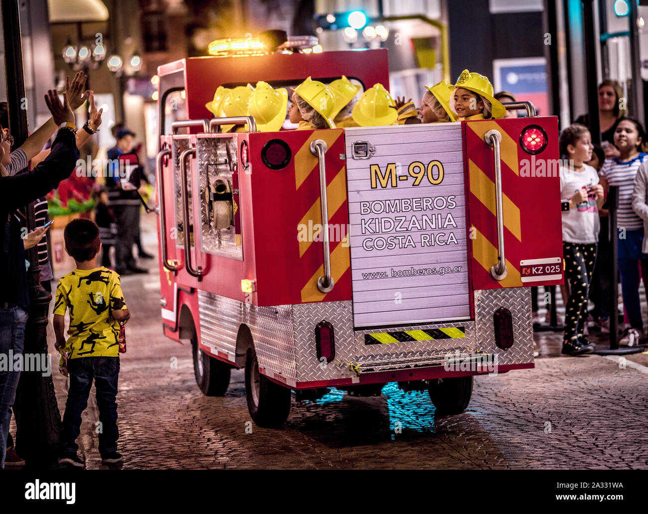 ock fire engine speeding thotough the town answering a mock emergency ...