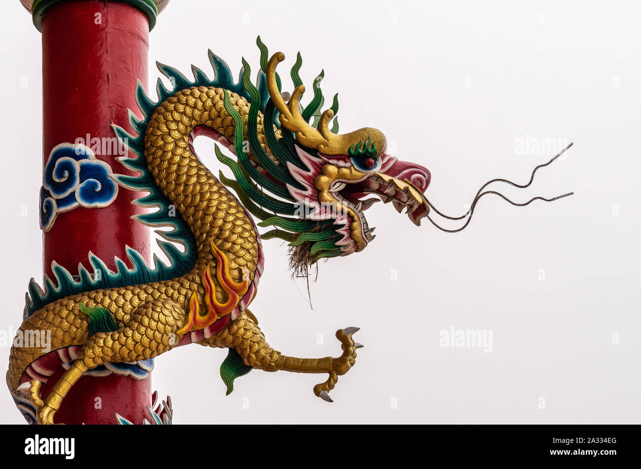Si Racha, Thailand - March 16, 2019: Menacing dragon on red pillar at ...
