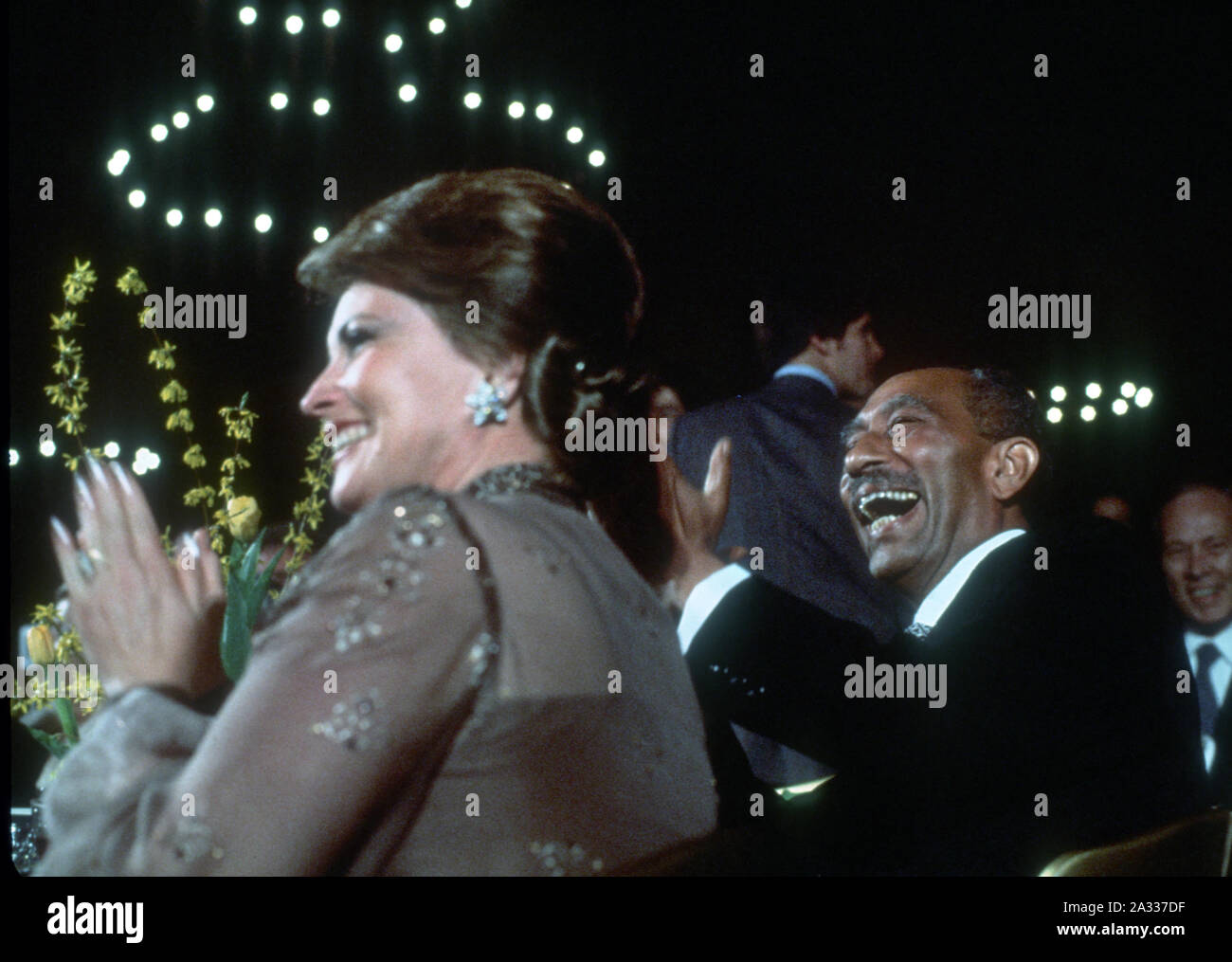 A 26.4 MG IMAGE OF: JEHAN AND ANWAR SADAT AT STATE DINNER. Photo by ...