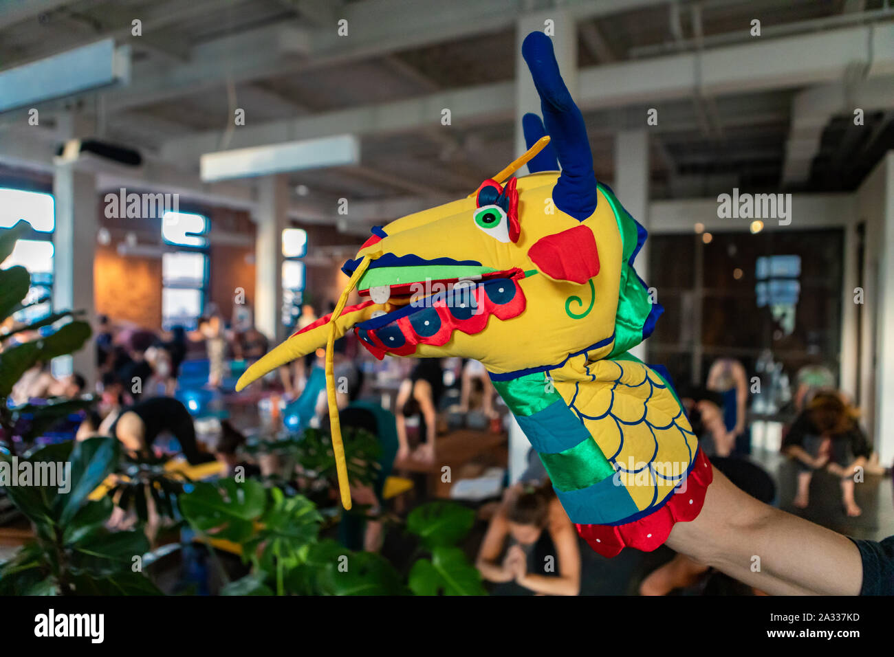 A close up and side profile view of a hand puppet on the arm of a ...
