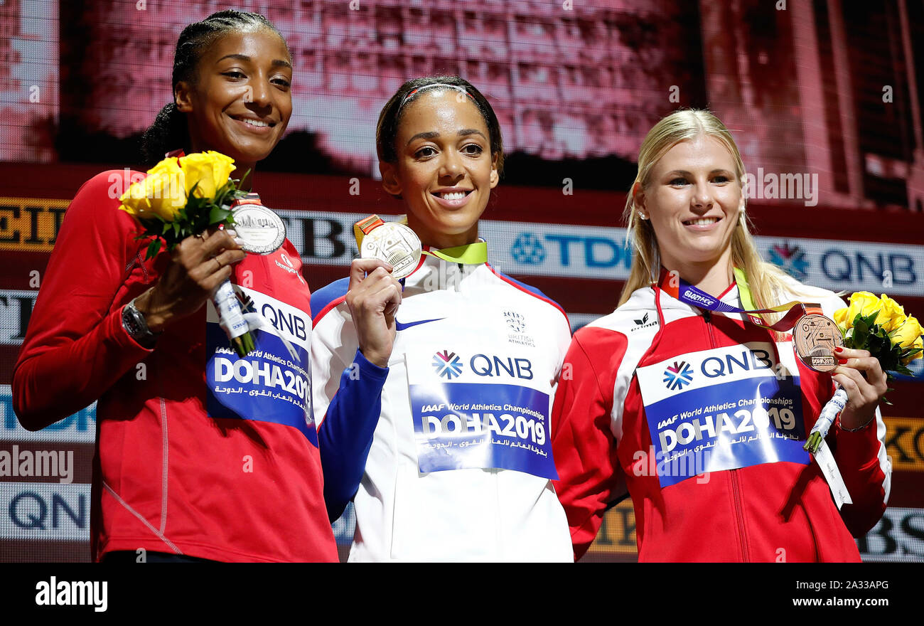 Doha, Qatar. 4th Oct, 2019. Gold medalist Katarina Johnson-Thompson (C ...