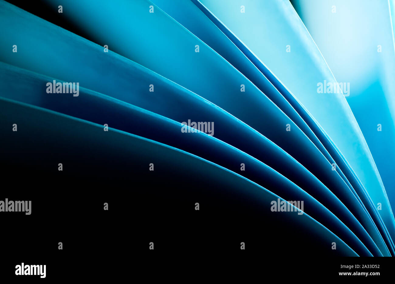 bright blue colored illuminated notepad in various position and ...