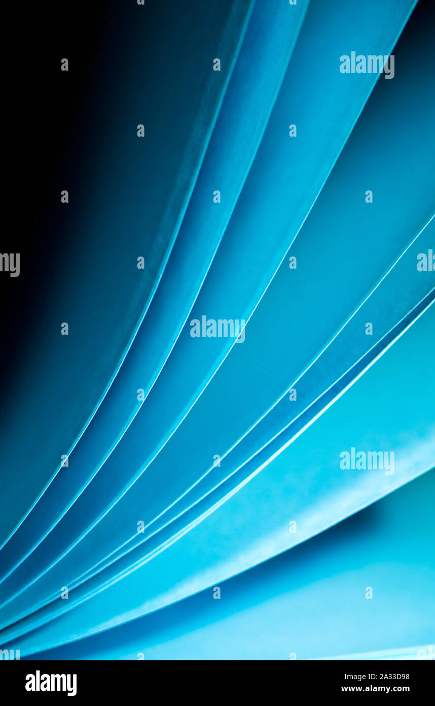 bright blue colored illuminated notepad in various position and ...