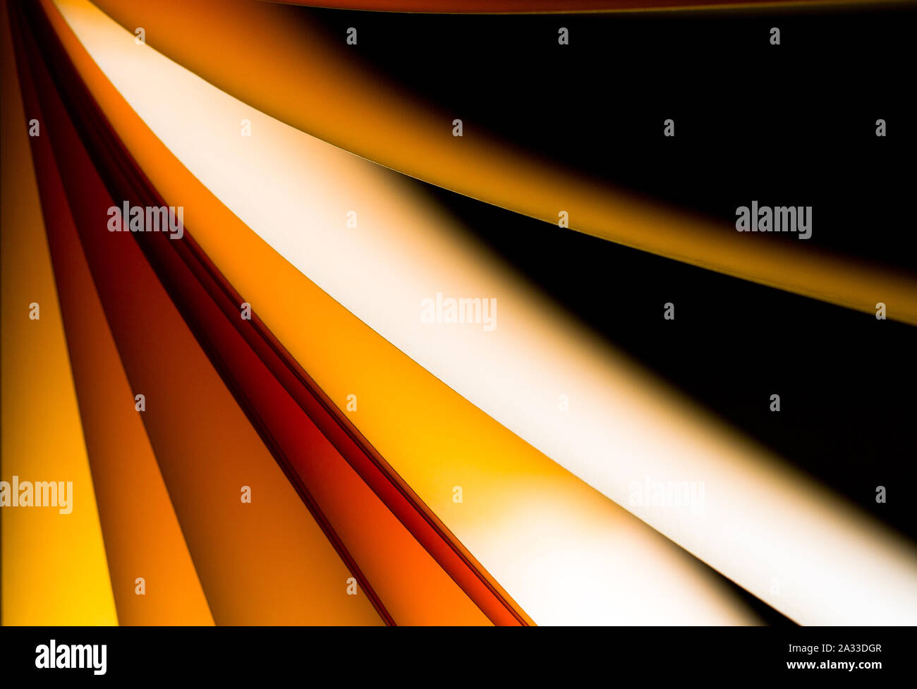 bright orange colored illuminated notepad in various position and ...