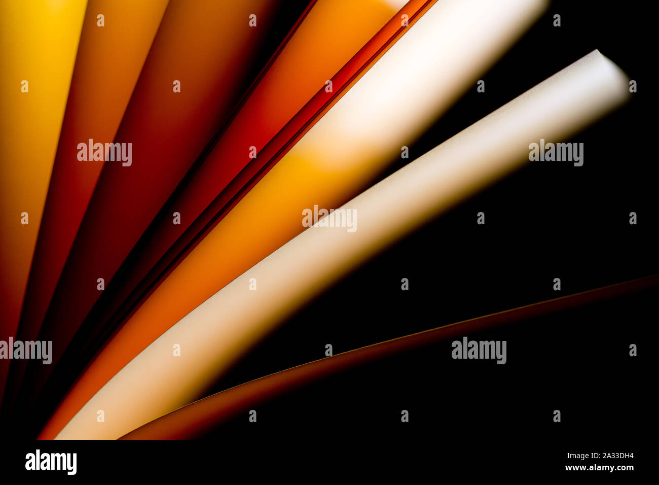 bright orange colored illuminated notepad in various position and ...