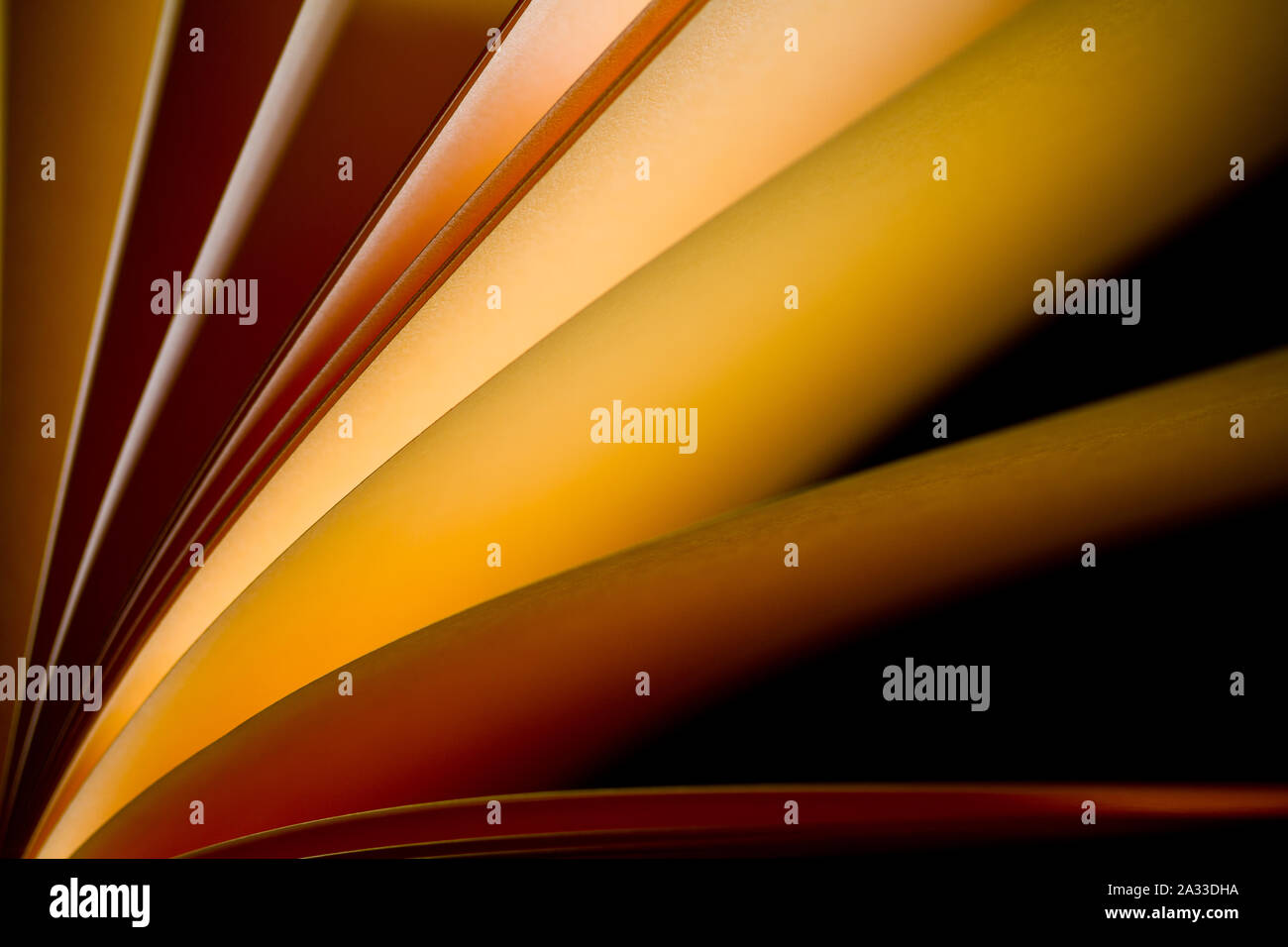 bright orange colored illuminated notepad in various position and ...