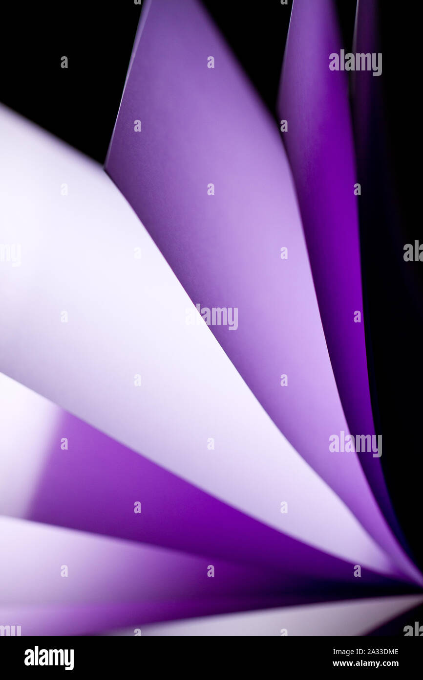 bright purple colored illuminated notepad in various position and ...