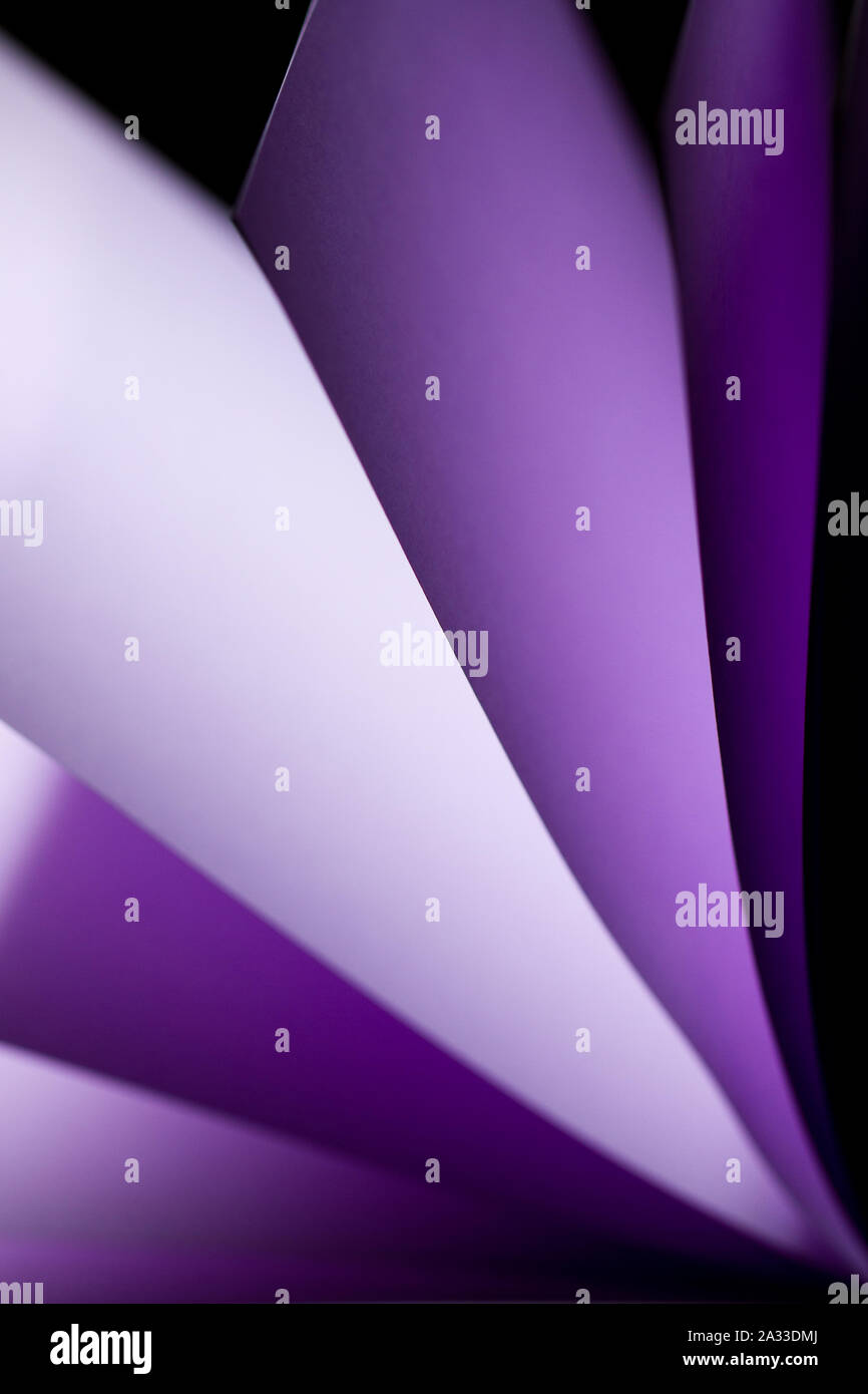 bright purple colored illuminated notepad in various position and ...