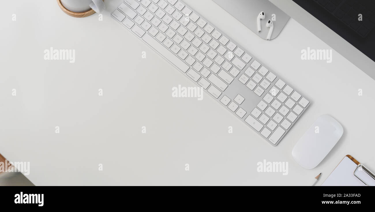 Top view of modern workplace with keyboard computer and office supplies ...
