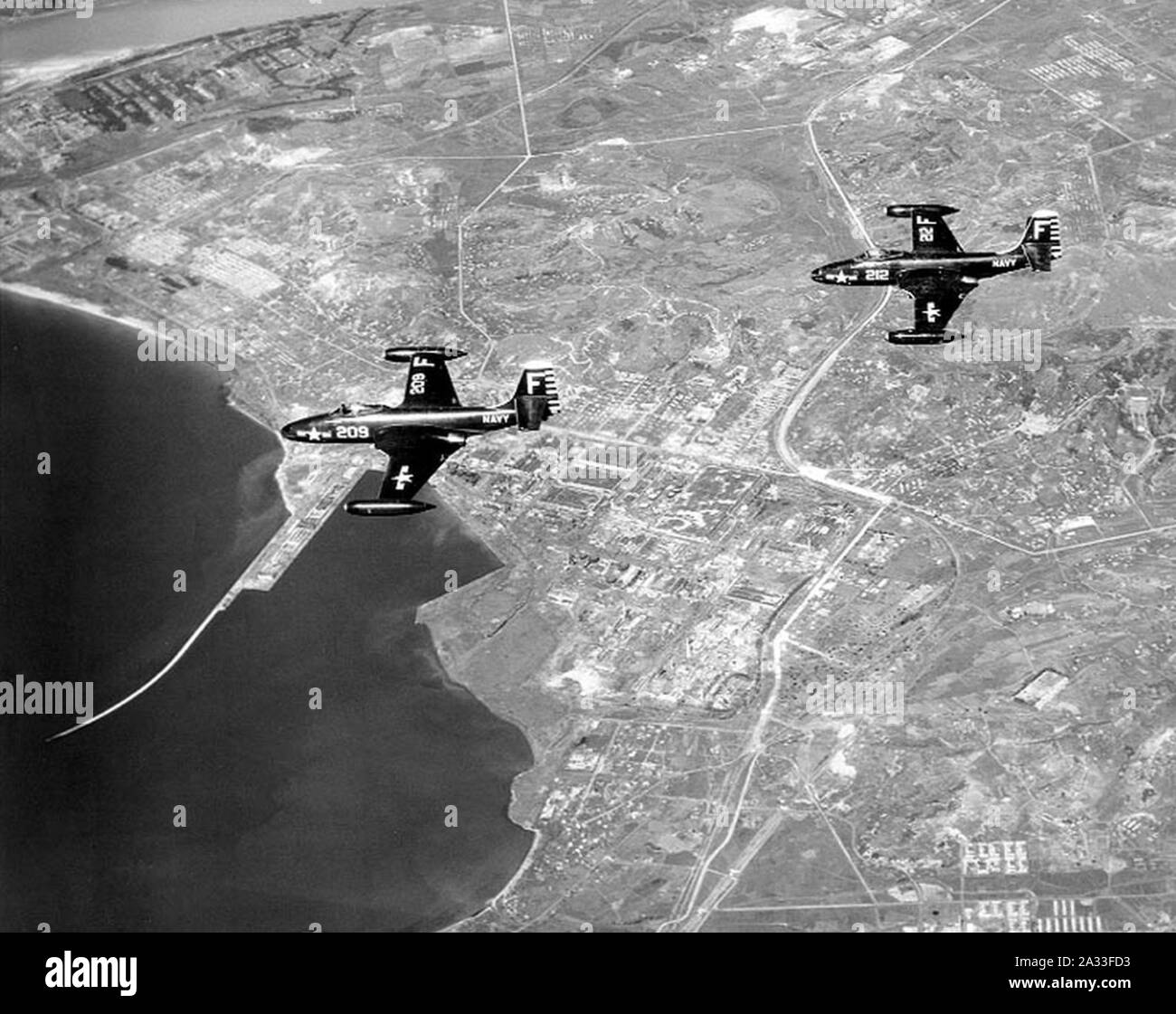 F2H-2 Banshees of VF-62 in flight over Hungnam on 26 July 1953 (80-G ...