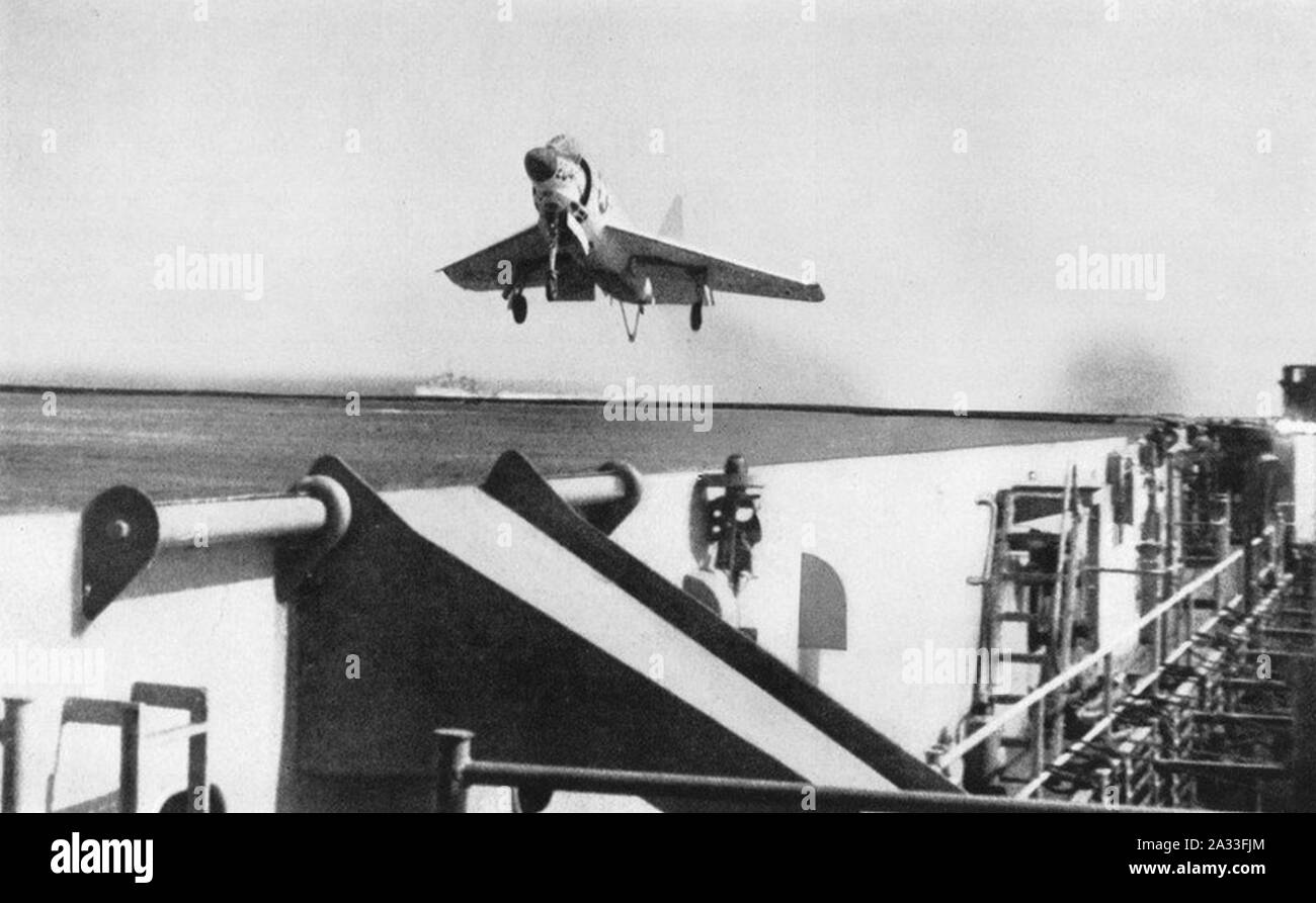 F3H-2 Demon of VF-124 on lands on USS Lexington (CVA-16) in 1957 Stock ...