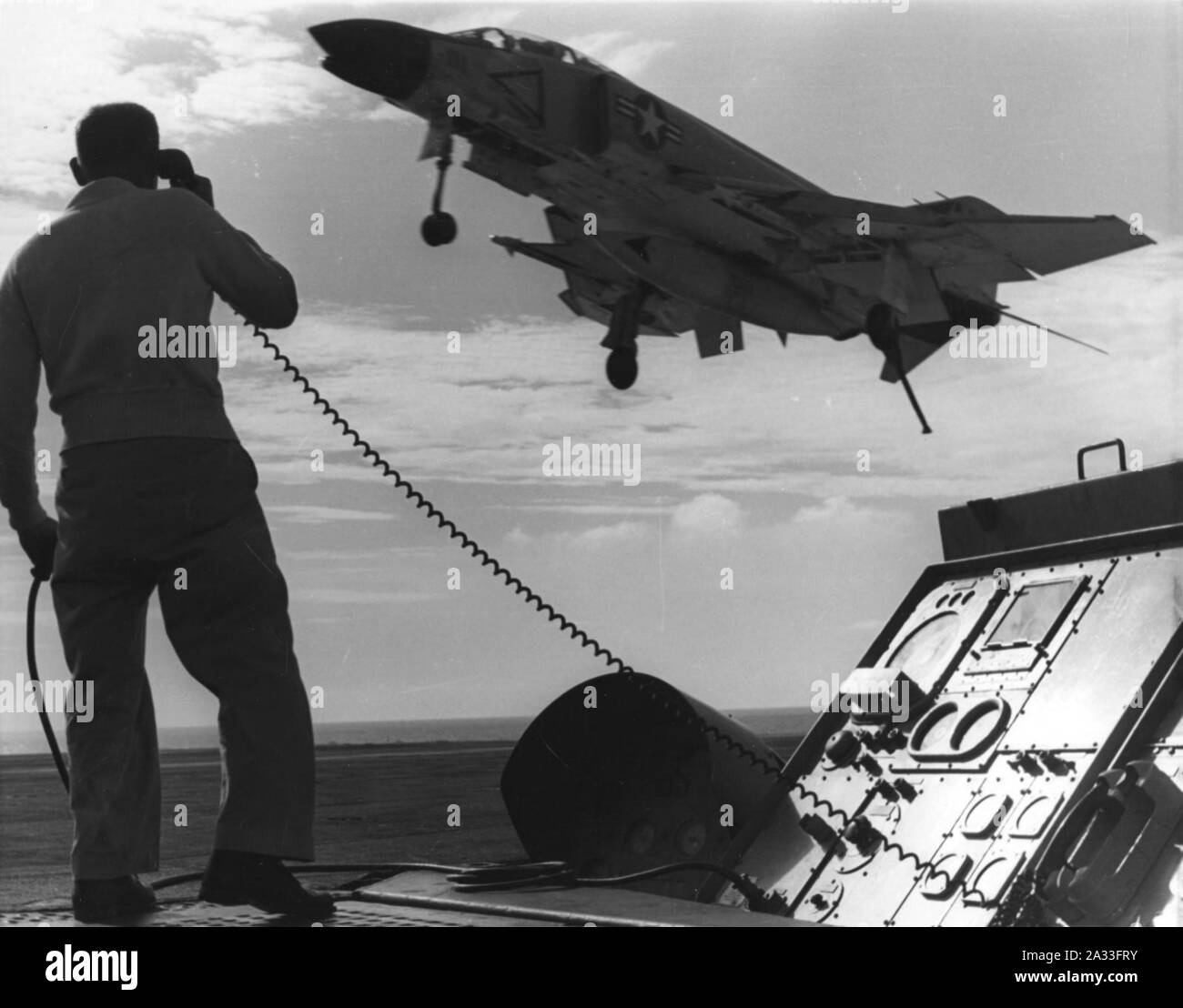 F-4B of VF-21 returns to USS Midway (CVA-41) off Vietnam in 1965 Stock ...