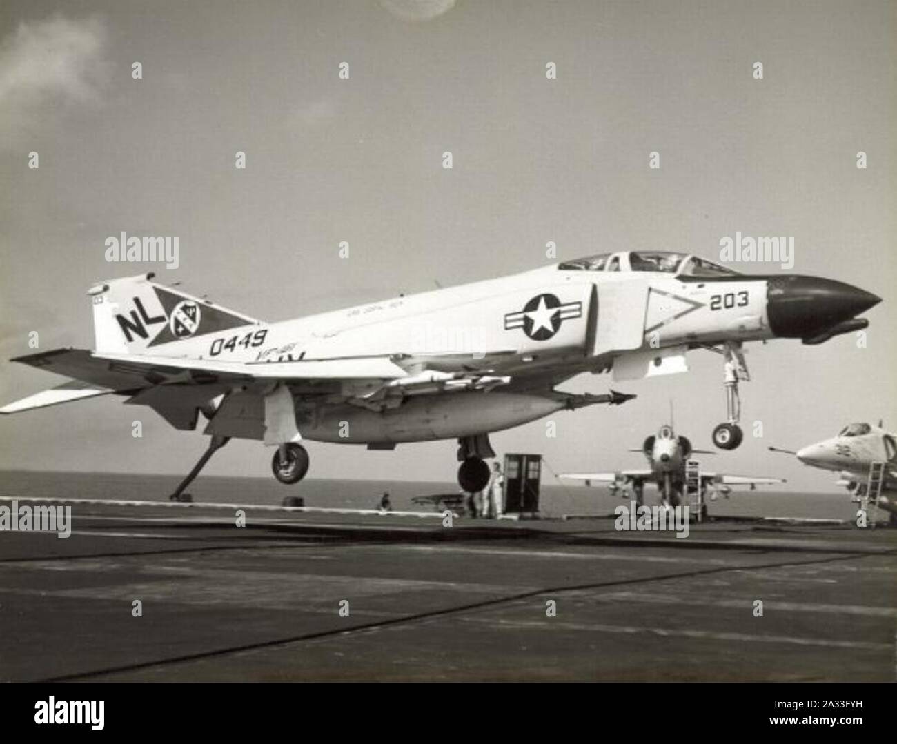 F-4B Phantom II of VF-161 landing on USS Coral Sea (CVA-43) in 1967 ...