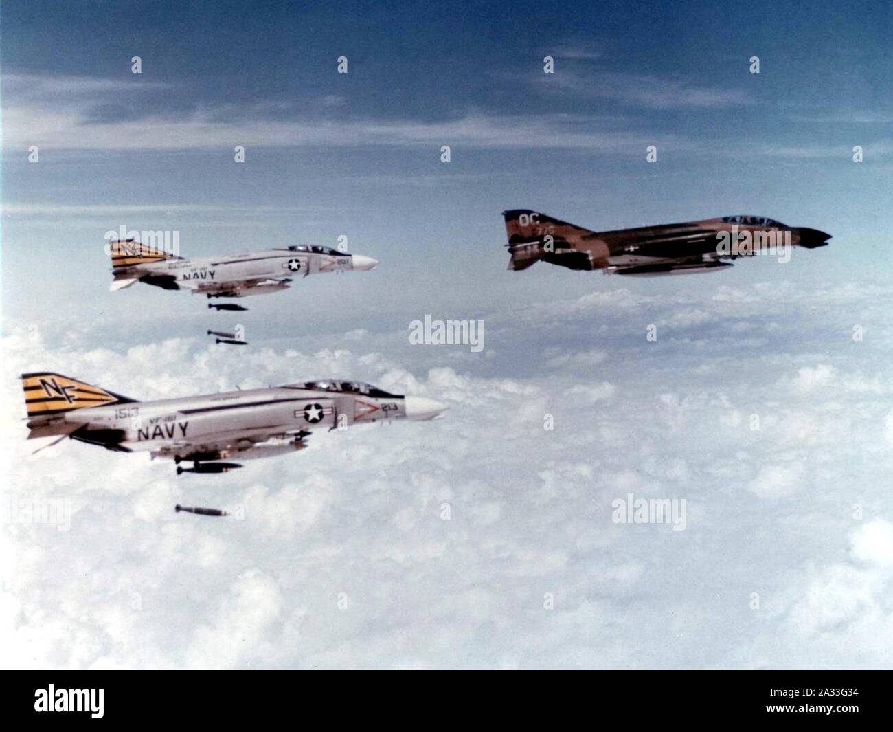 F-4D 13th TFS leads VF-151 F-4Bs on bombing mission 1971 Stock Photo ...