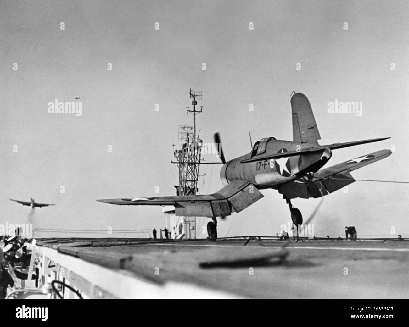 F4U-1 VF-17 landing on USS Charger (CVE-30) 1943 Stock Photo - Alamy