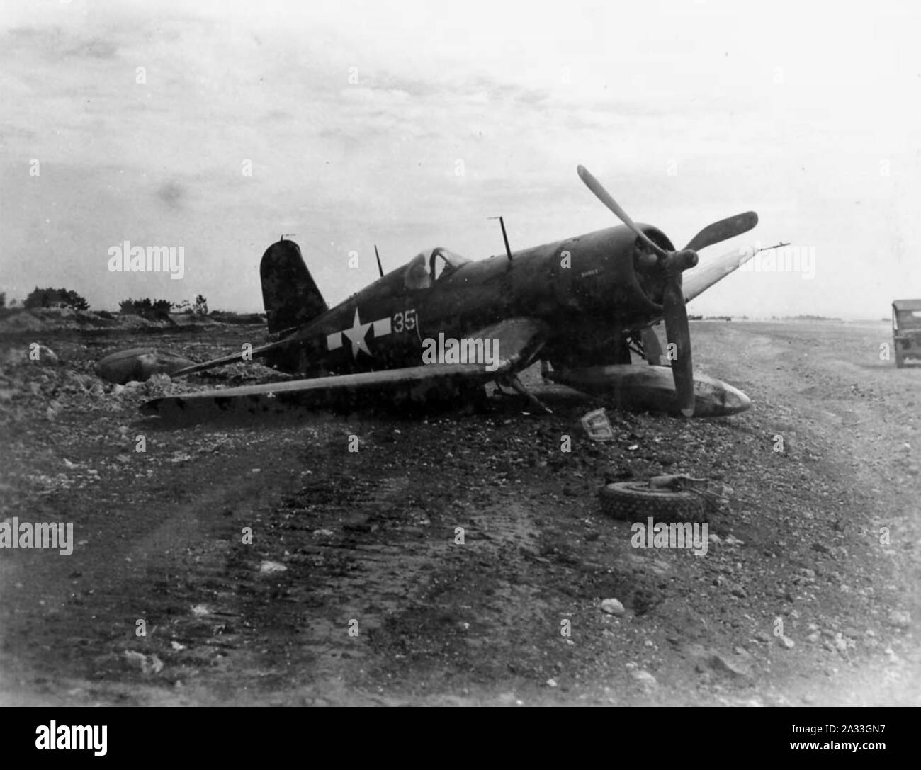 F4U VMF-314 battle damaged on Ie Shima 1945 Stock Photo - Alamy