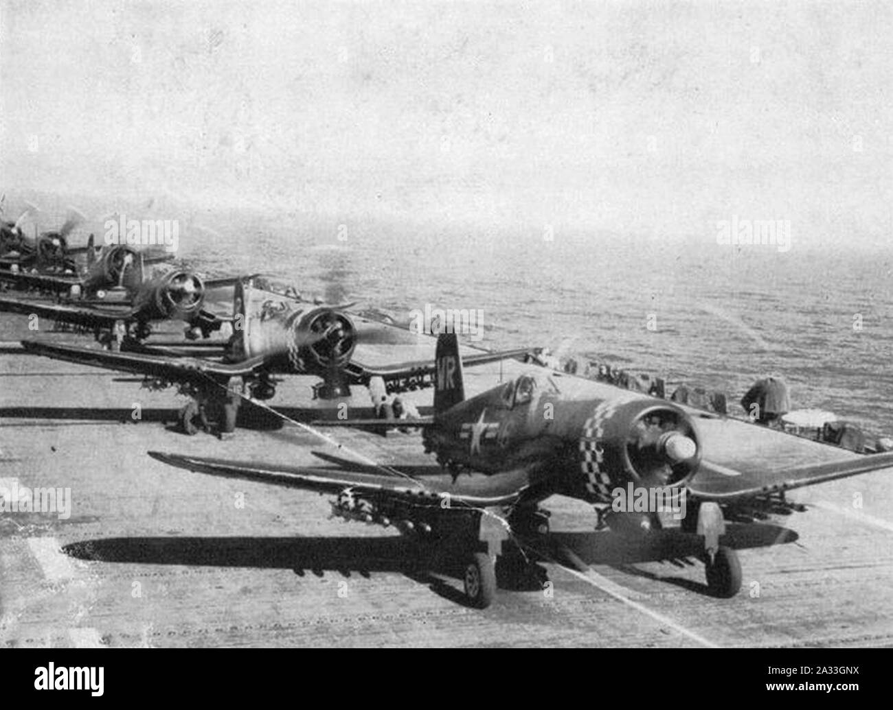 F4U-4 Corsairs of VMA-312 aboard USS Bairoko (CVE-115) in 1952 Stock ...