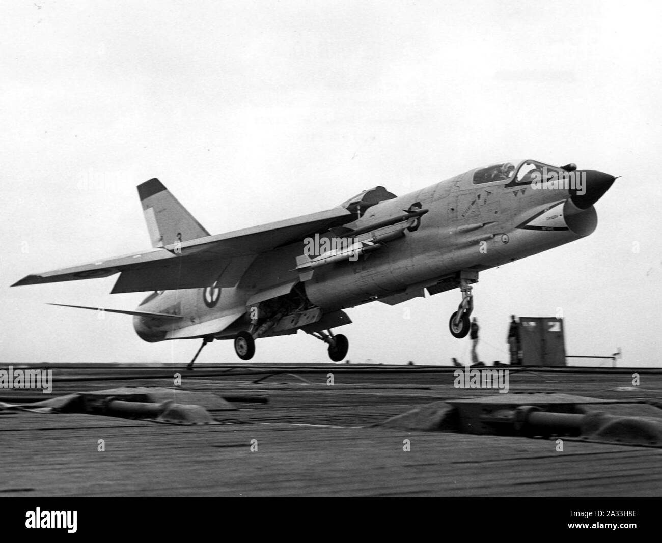 F-8E(FN) landing on carrier c1964 Stock Photo - Alamy