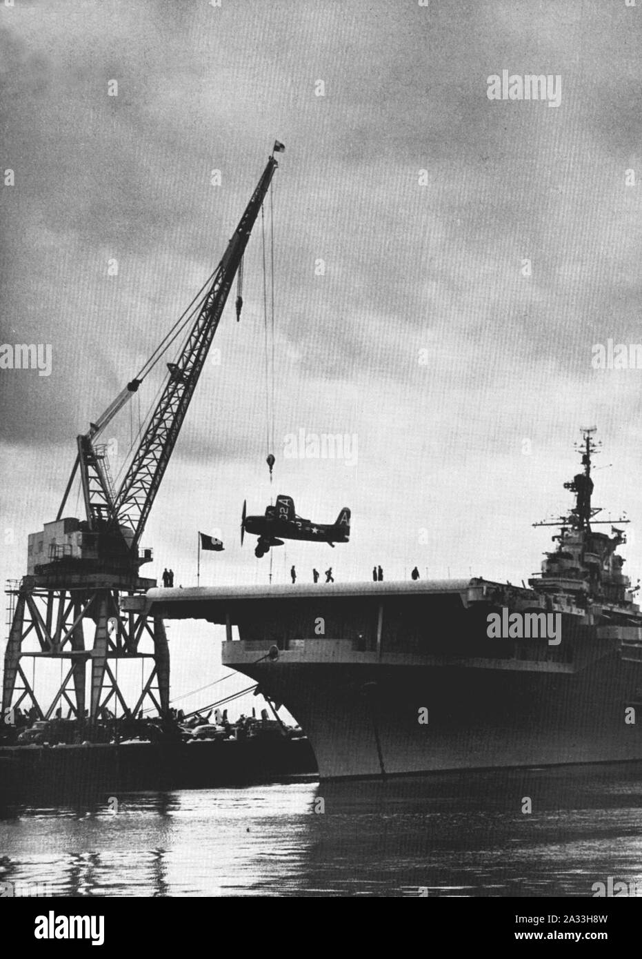 F8F is loaded on USS Boxer (CV-21) at NAS Alameda in 1950 Stock Photo ...