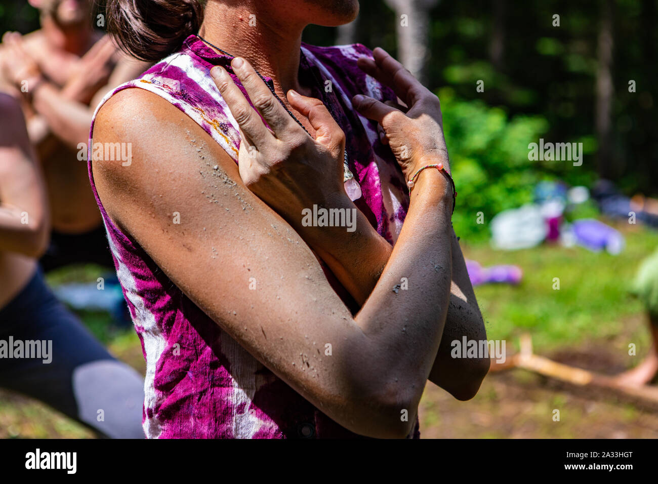 Young woman with arms crossed over chest hi-res stock photography and ...