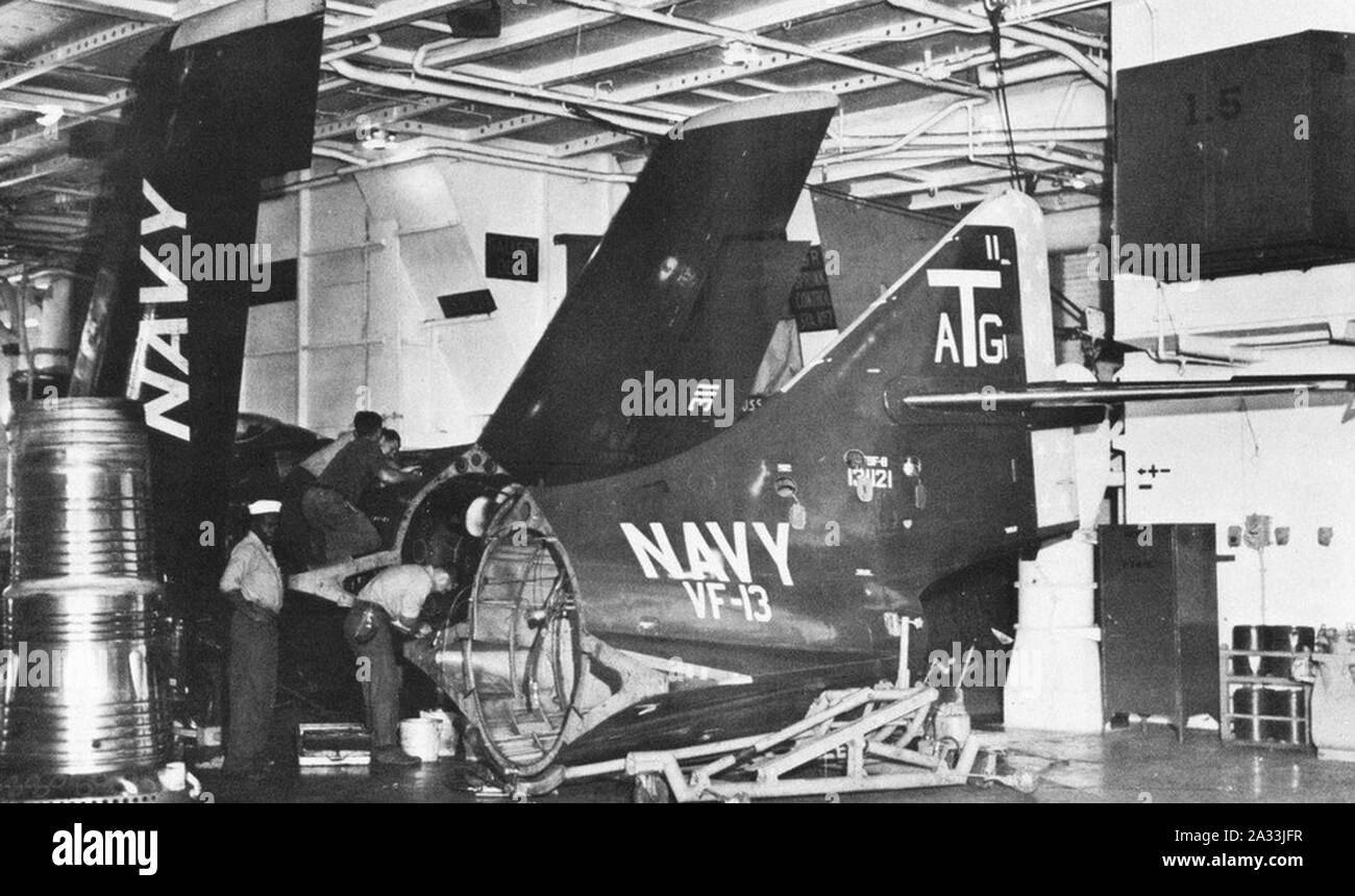 F9F-8 of VF-13 in hangar of USS Bennington (CVA-20) c1956 Stock Photo ...