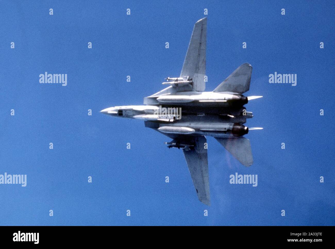F-14 bottom view with wings forward Stock Photo - Alamy